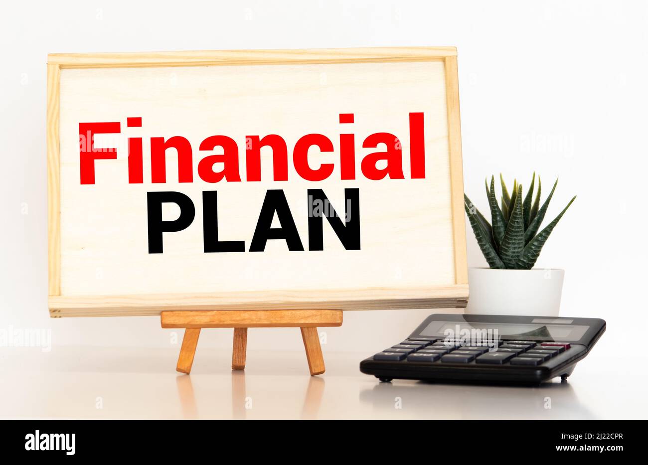 Financial Plan word writing on paper, concept Stock Photo - Alamy