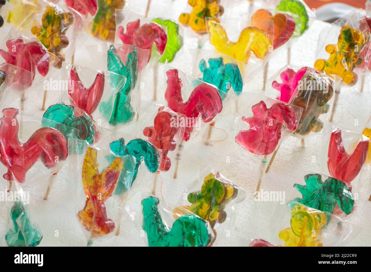 Colorful swirl lollipops at confectionery. Sweet candy for kids party ...