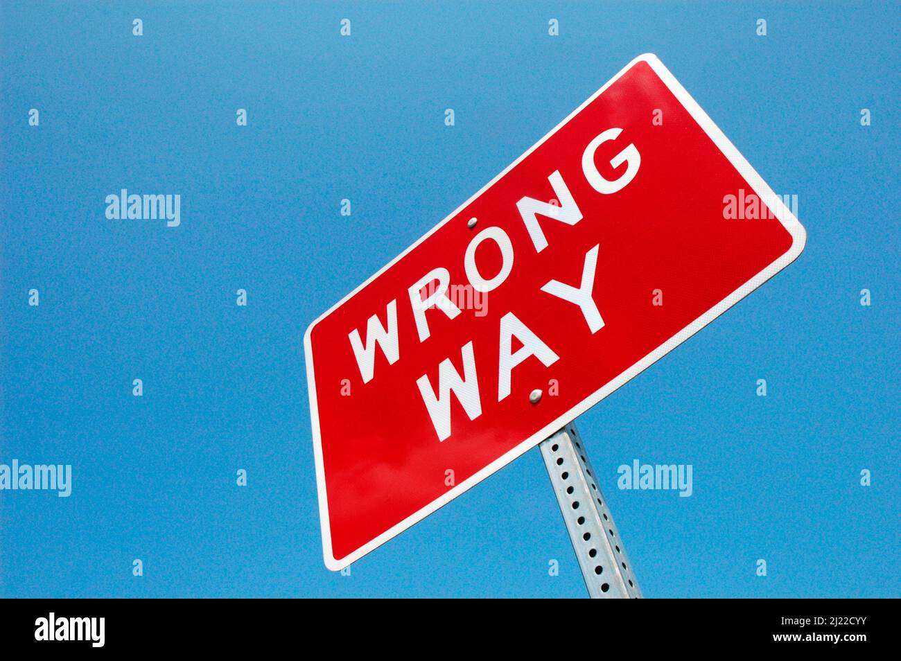 Wrong Way driving sign on highway as warning to drivers Stock Photo - Alamy