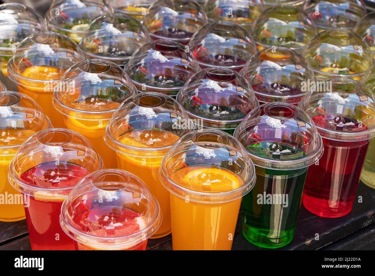 Soft drinks in plastic cups Stock Photo - Alamy