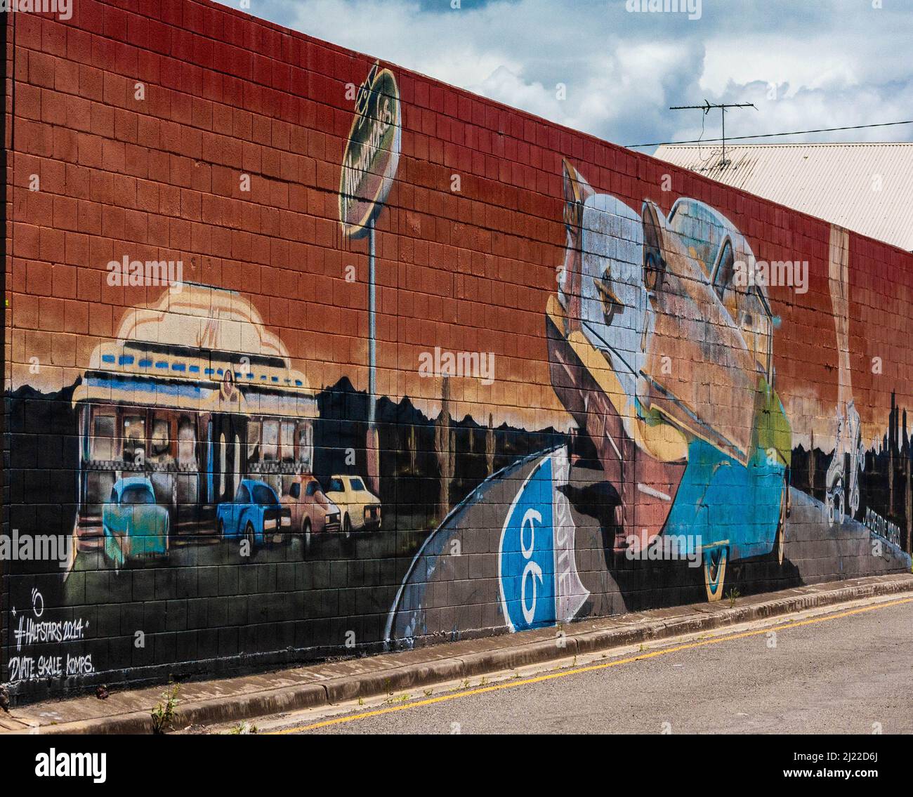 A vertical shot of beautiful graffiti art of a bar on route 66 with ...