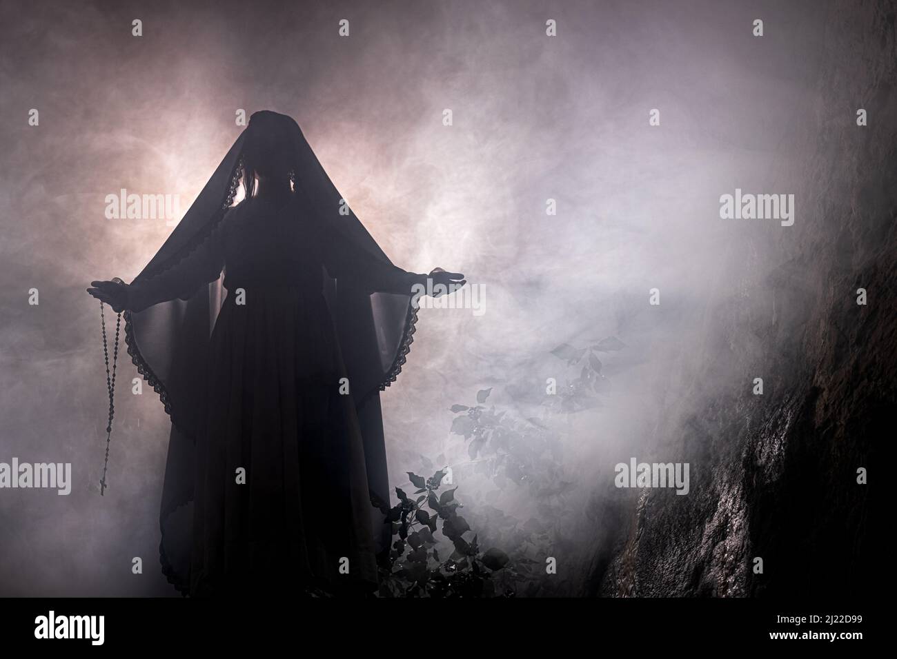 A silhouette of mather Marry in the cave Stock Photo - Alamy