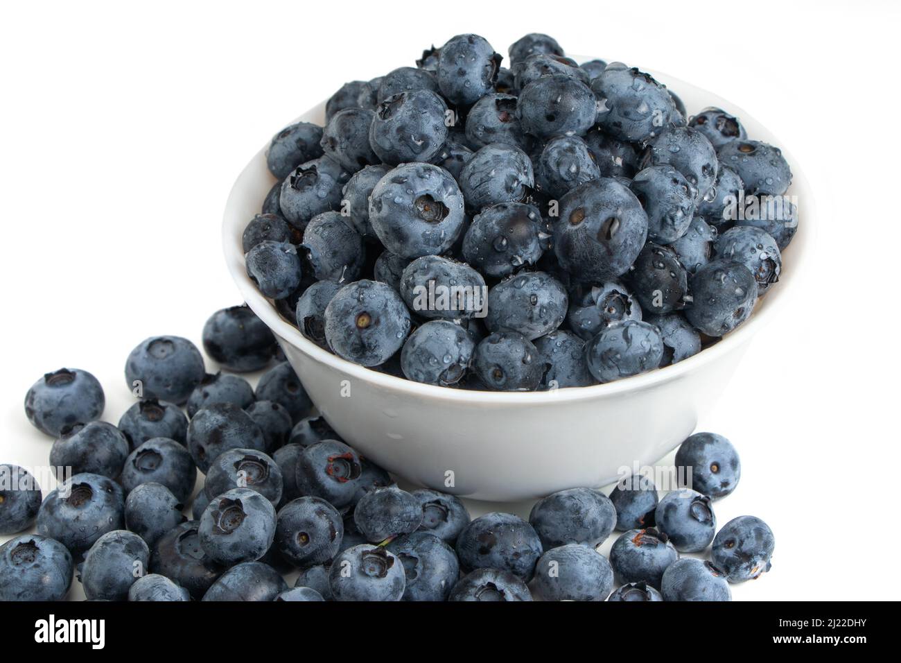 Blueberries in bowl isolated on white background Stock Photo - Alamy