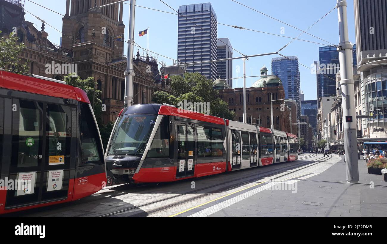 A modern black and red train on the railroads of the Sydney Metro ...