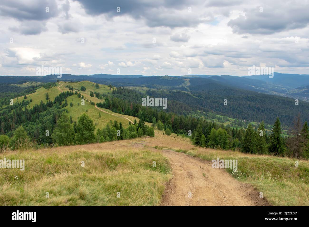 Mountain path to hill summer landscape Stock Photo - Alamy