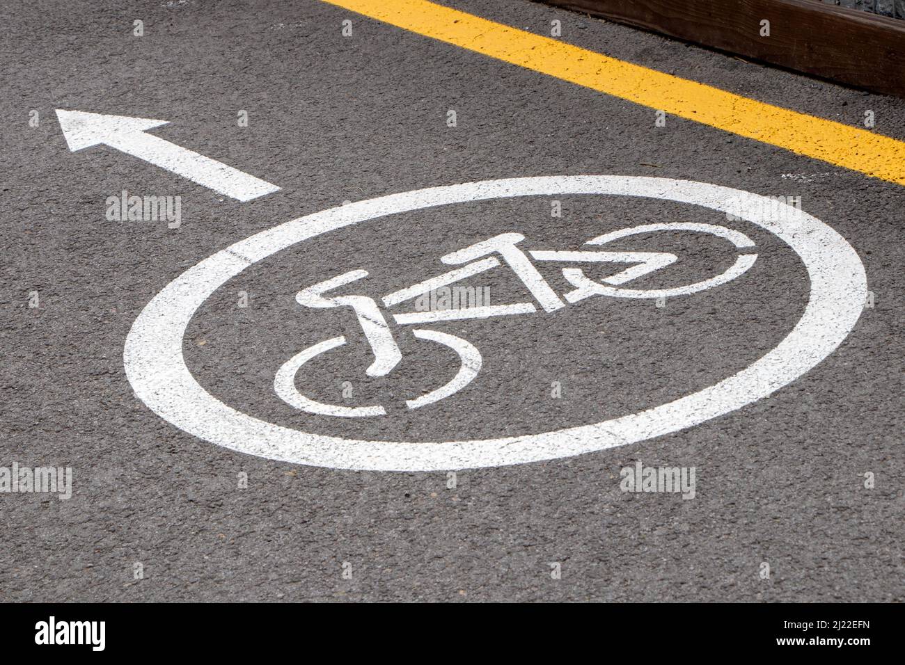 white painted sign for bikes Stock Photo - Alamy