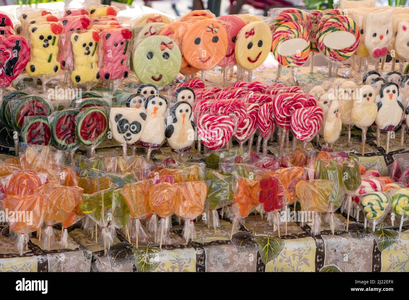 Colorful swirl lollipops at confectionery. Sweet candy for kids party ...