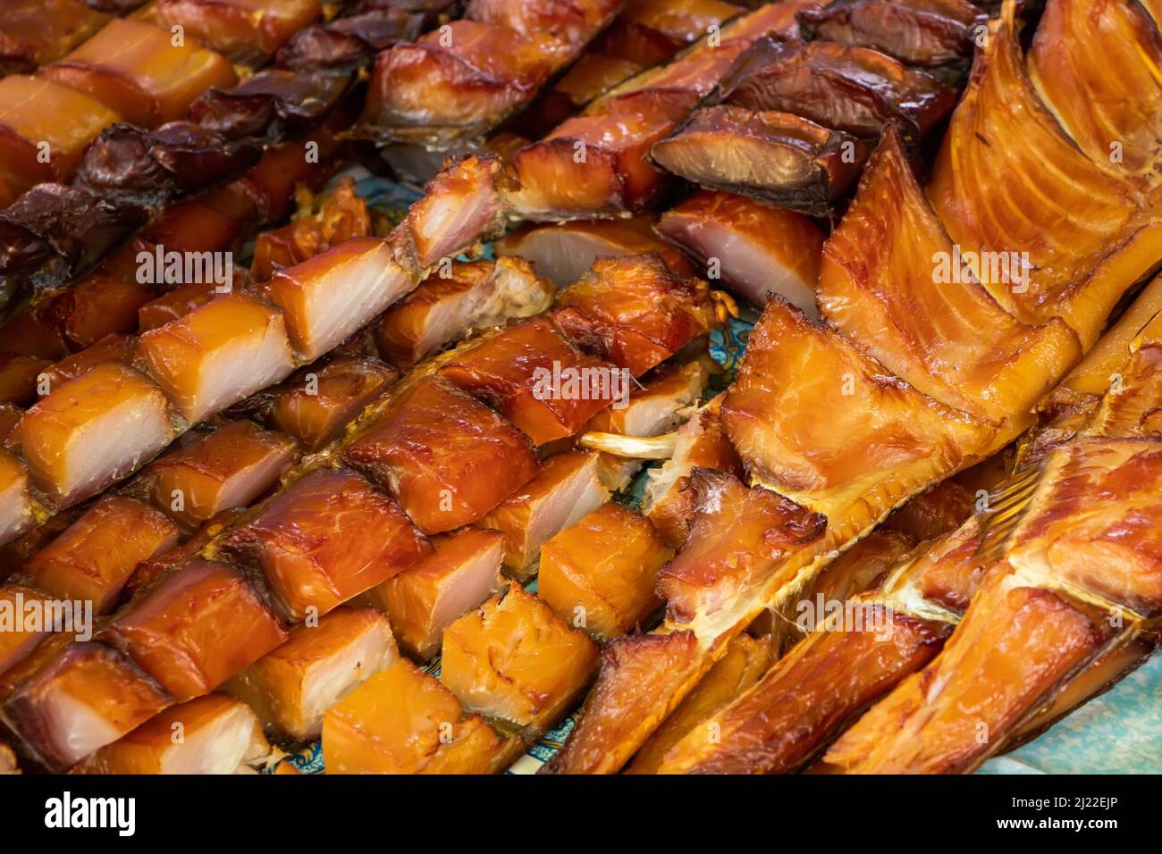 A variety of smoked fish. Beautiful fish showcase. Delicious seafood ...