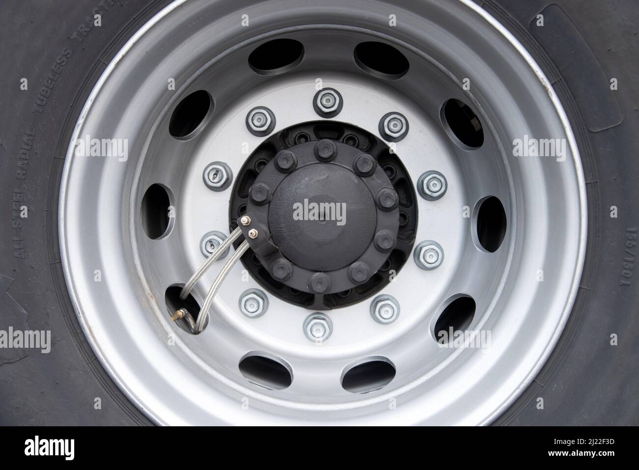 The rear wheels of a clean truck with new tires. Radial tubeless tires ...