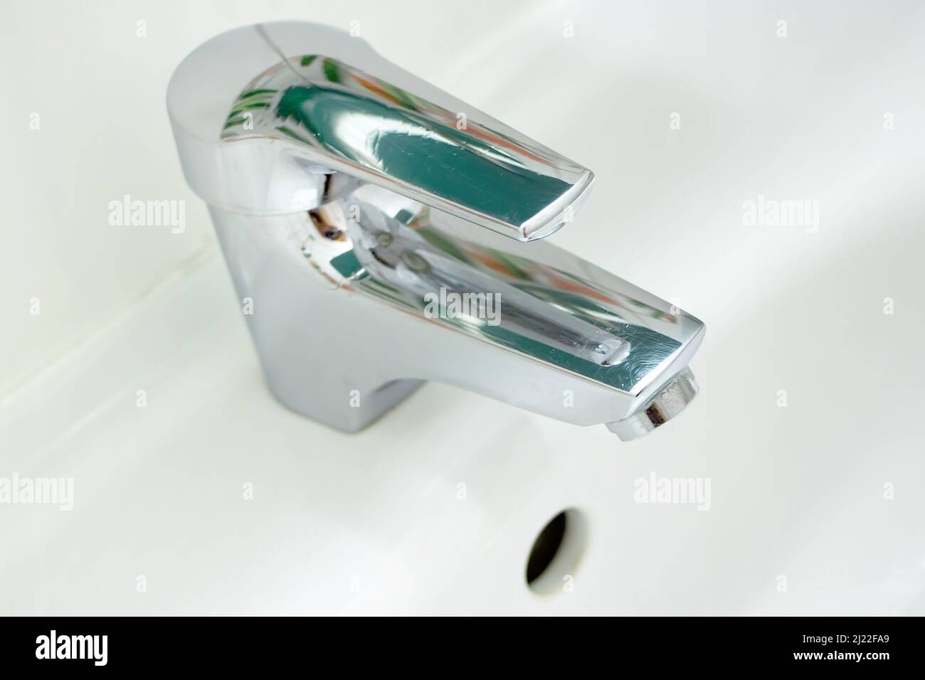 The water tap, faucet for the bathroom and kitchen mixer. Chrome-plated ...