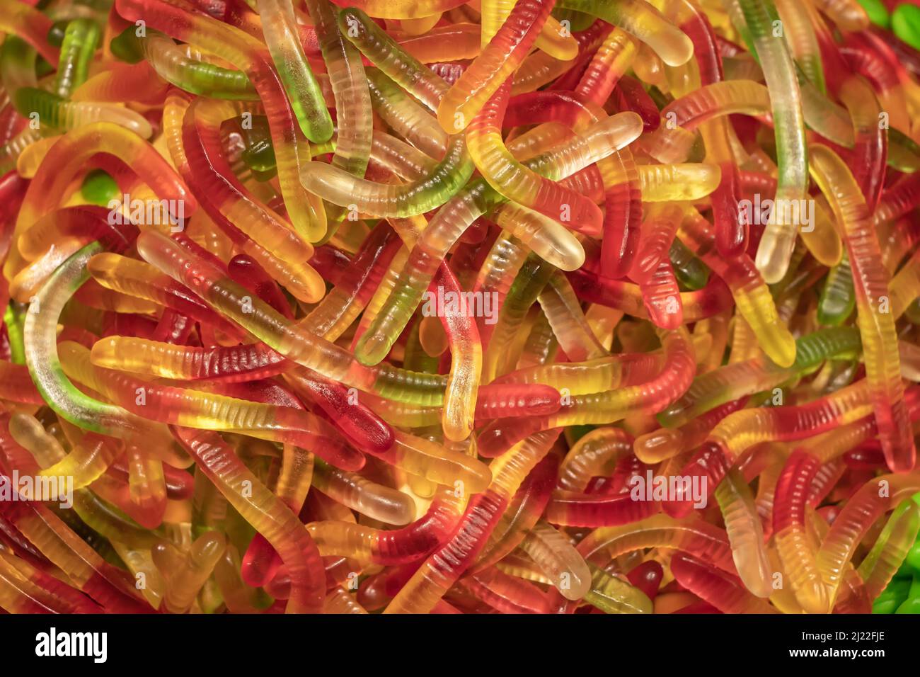 Texture colored sugary gummy worms hi-res stock photography and images ...