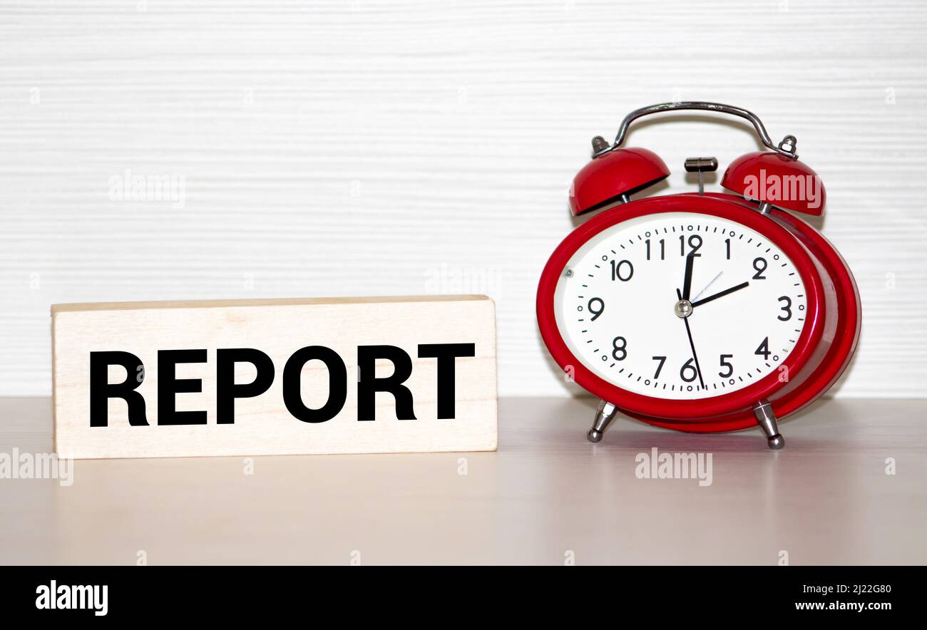 Reports Binder in the Office and alarm clock Stock Photo - Alamy