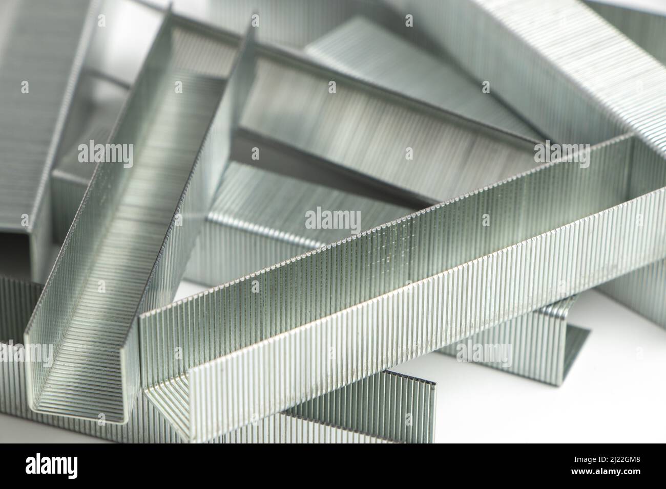 Metal staples for stapler isolated on white background Stock Photo - Alamy