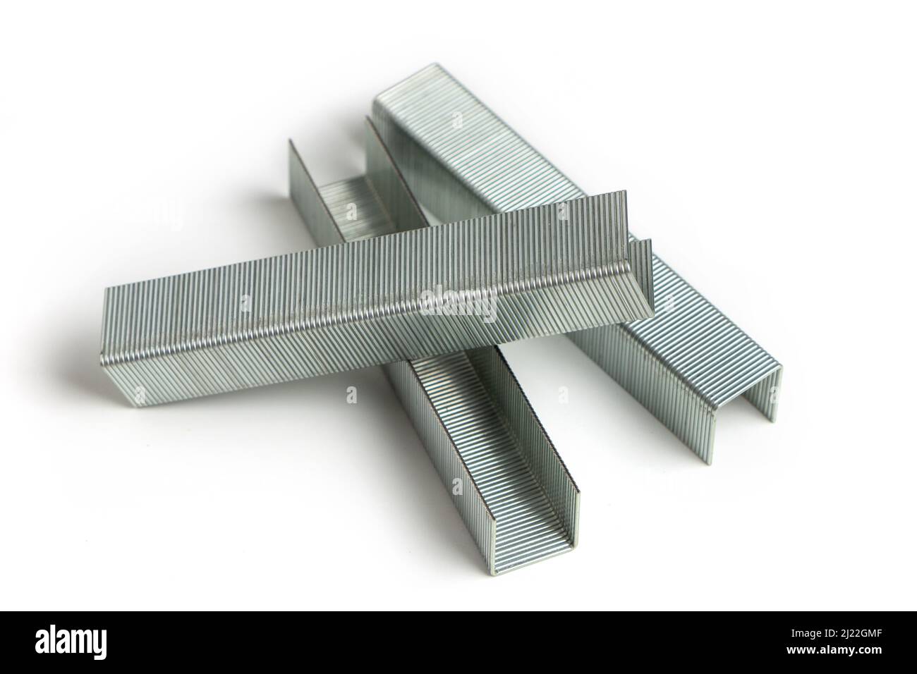Metal staples for stapler isolated on white background Stock Photo - Alamy