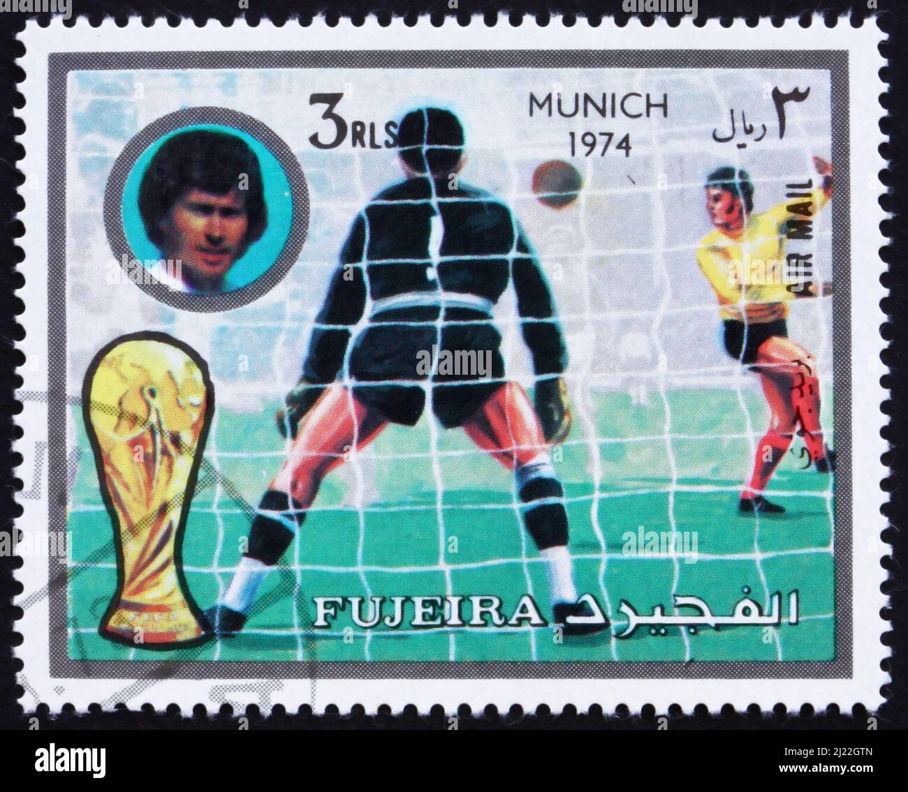 FUJEIRA - CIRCA 1972: a stamp printed in the Fujeira shows Football ...