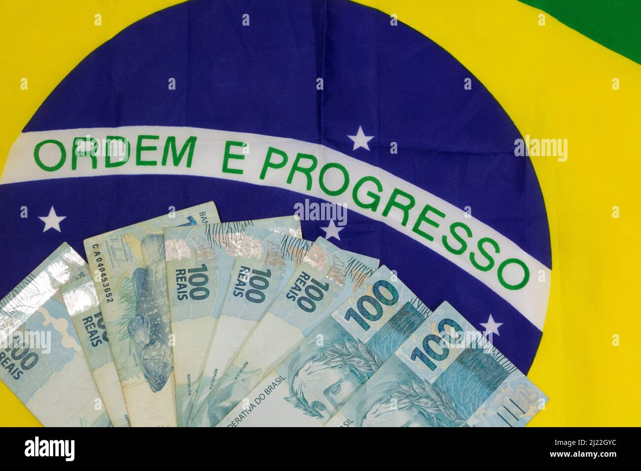 Brazilian Flag with Brazilian Money. Flag and Brazil Cash Stock Photo ...