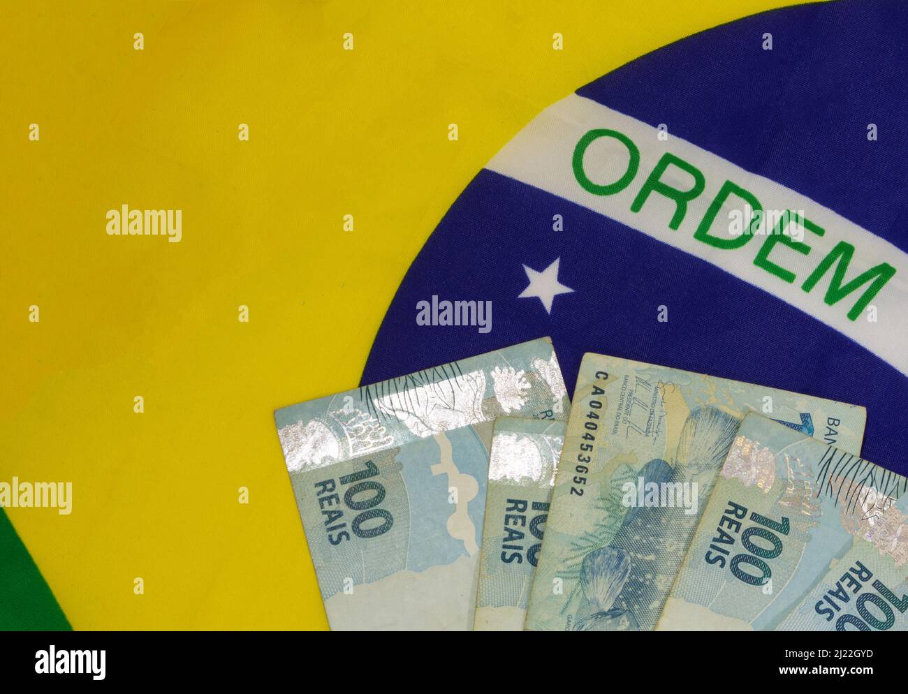 Brazilian Flag with Brazilian Money. Flag and Brazil Cash Stock Photo ...