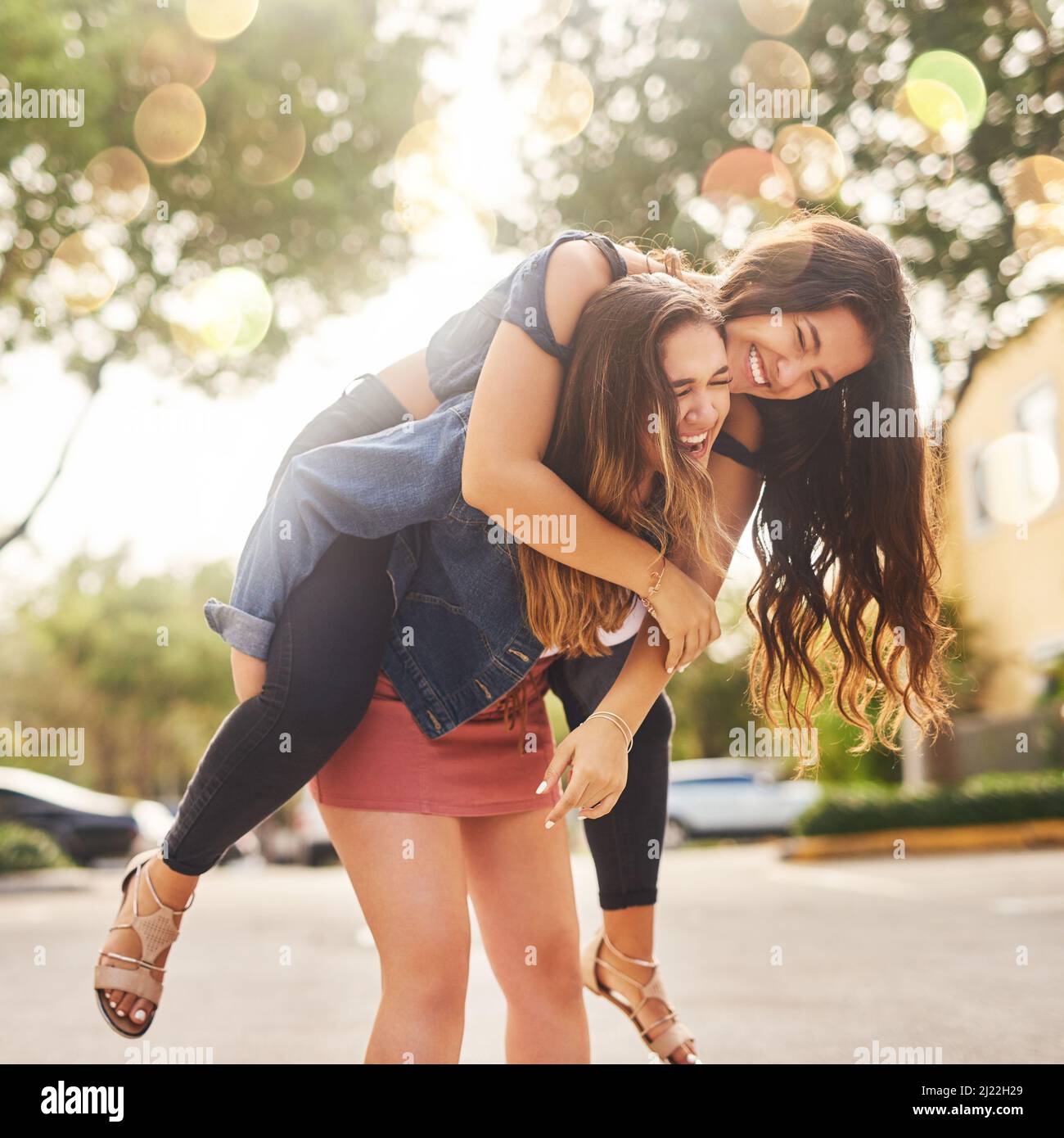 I have so much fun with my bestie. Cropped shot of two female best ...
