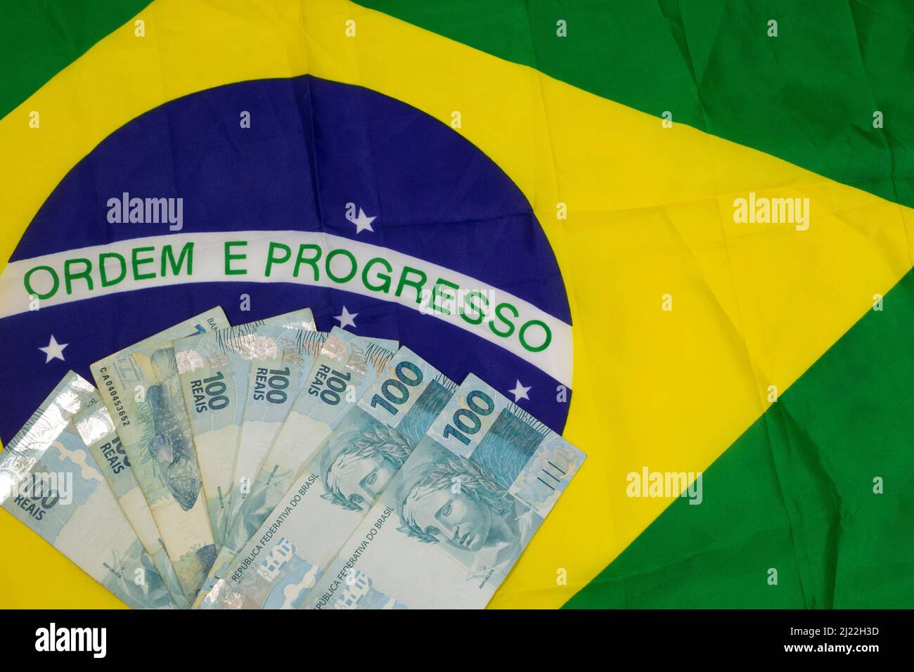 Brazilian Flag with Brazilian Money. Flag and Brazil Cash Stock Photo ...