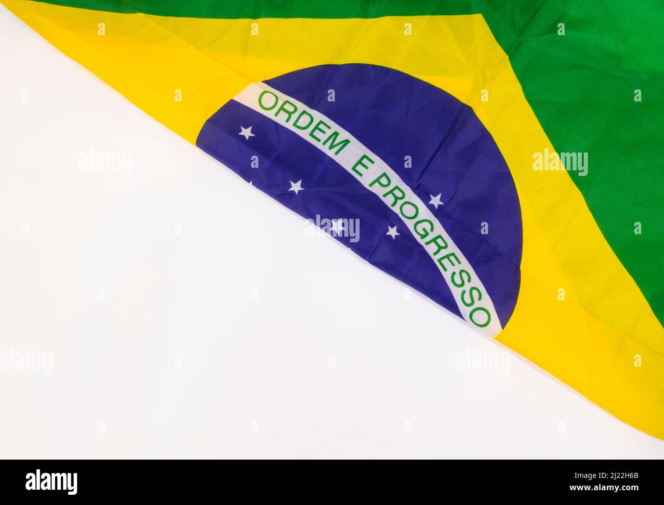 Brazilian waving flag isolated on white background. Green, yellow and ...