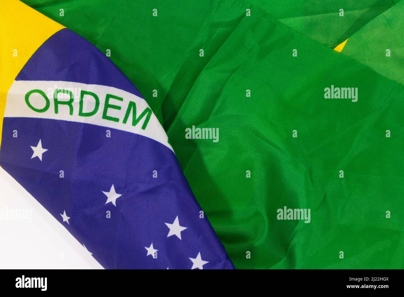 Brazilian waving flag isolated on white background. Green, yellow and ...