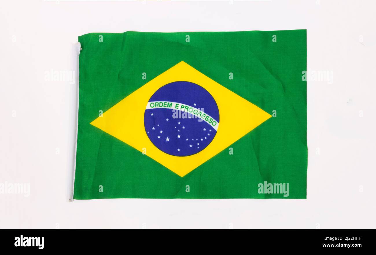 Brazilian waving flag isolated on white background. Green, yellow and ...