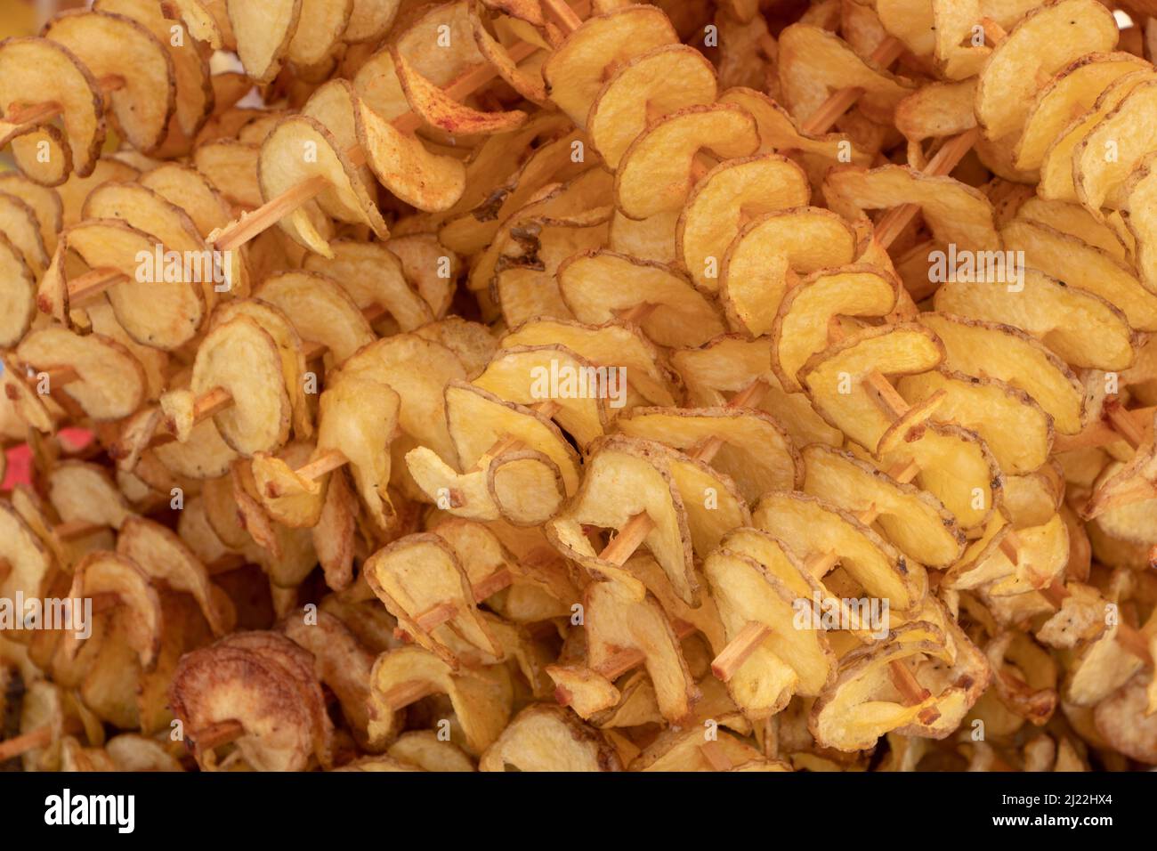 Homemade Spiral Cut Potato Chips at the Fair Stock Photo - Alamy