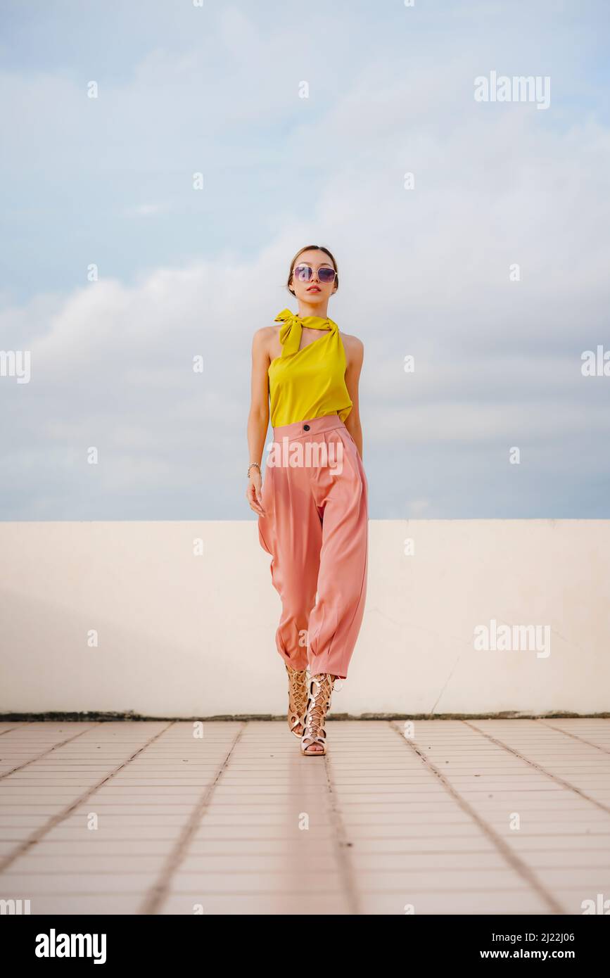 Beauty fashion girl with Tattooed. Portrait of slim Woman Wearing Crop ...