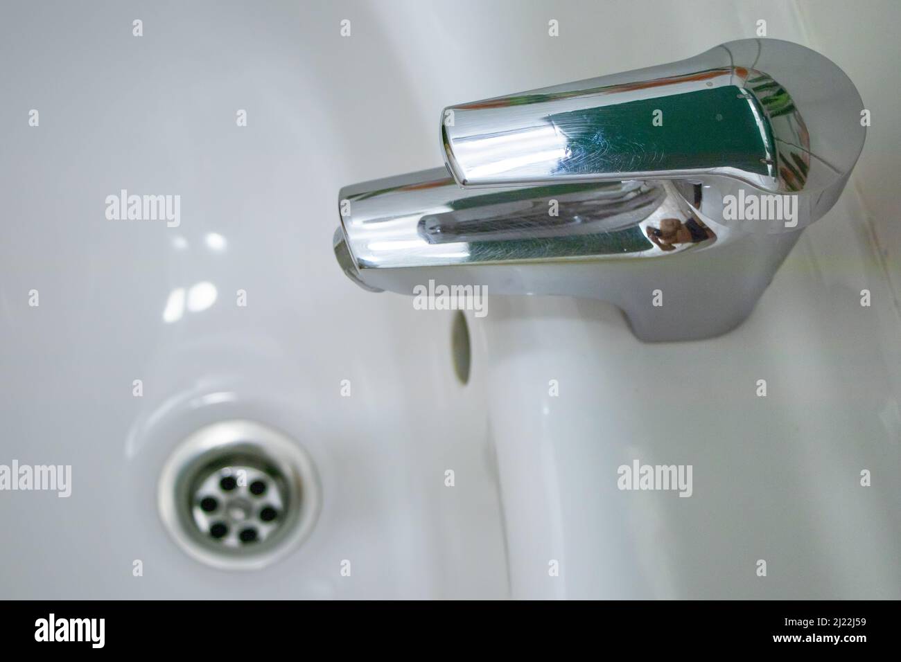 The water tap, faucet for the bathroom and kitchen mixer. Chrome-plated ...