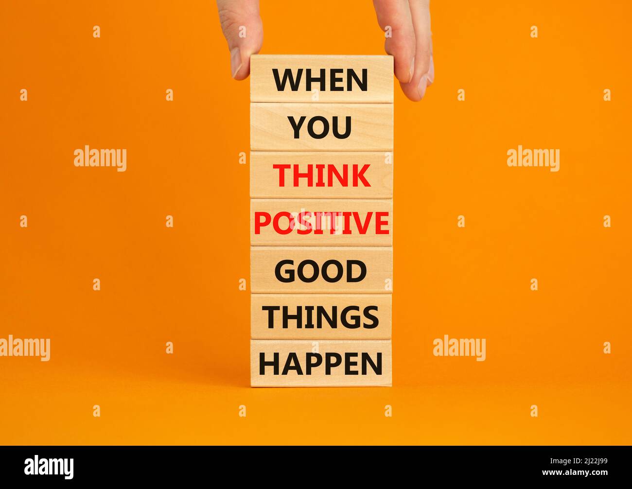 Think positive symbol. Wooden blocks with concept words When you think ...