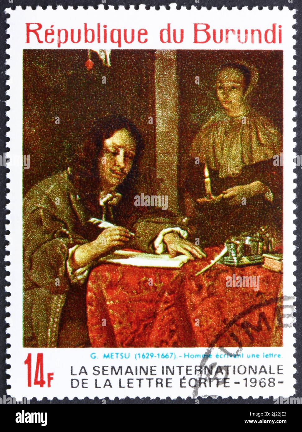 BURUNDI - CIRCA 1968: a stamp printed in the Burundi shows Man Writing ...