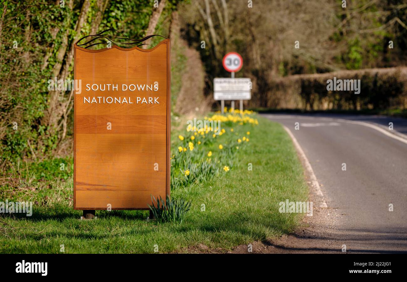 A sign for the South Downs National Park at the entrance to the village ...