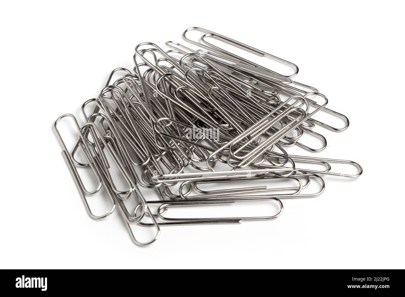 Paper silver clips on white background Stock Photo - Alamy