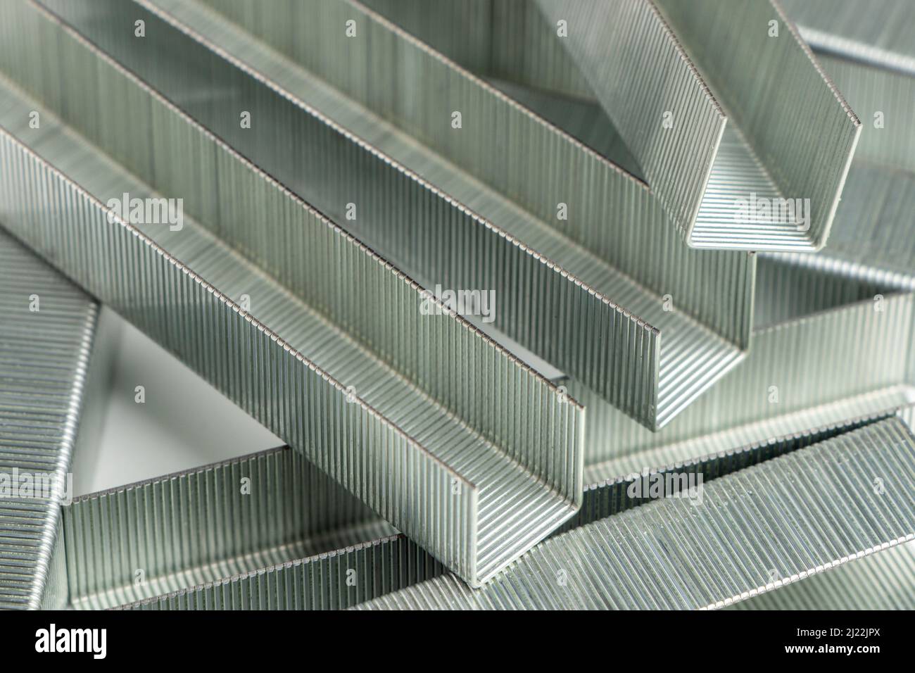 Metal staples for stapler isolated on white background Stock Photo - Alamy