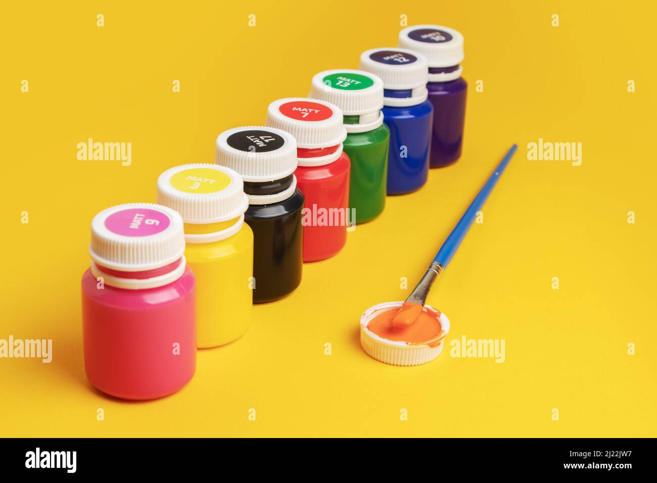 Mixing yellow blue paint to make green hi-res stock photography and ...