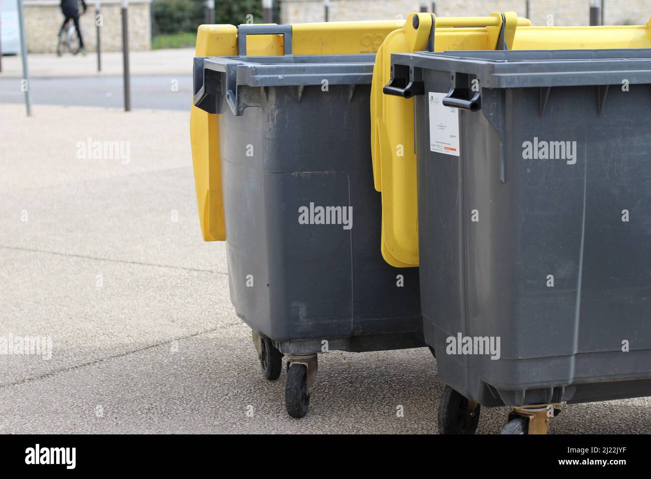 A shot of two recycle bins behind one another in the street Stock Photo ...
