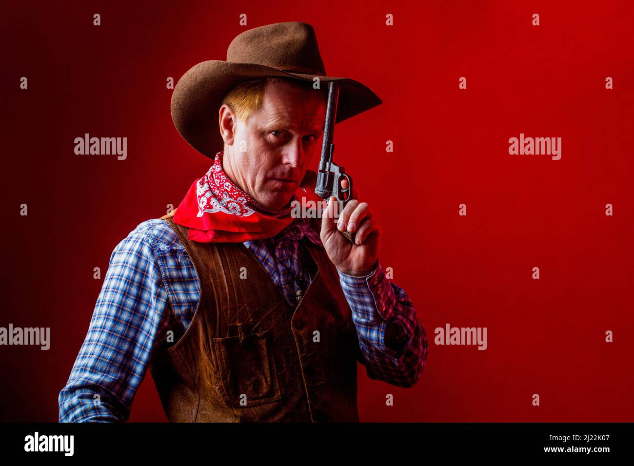 American bandit in mask, western man with hat. Portrait of cowboy in ...