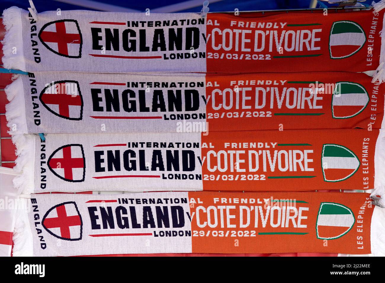 England and Ivory Coast half-and-half scarves on sale outside the ...