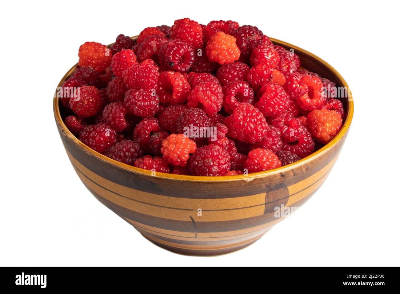 Bowl raspberry on wooden Cut Out Stock Images & Pictures - Alamy