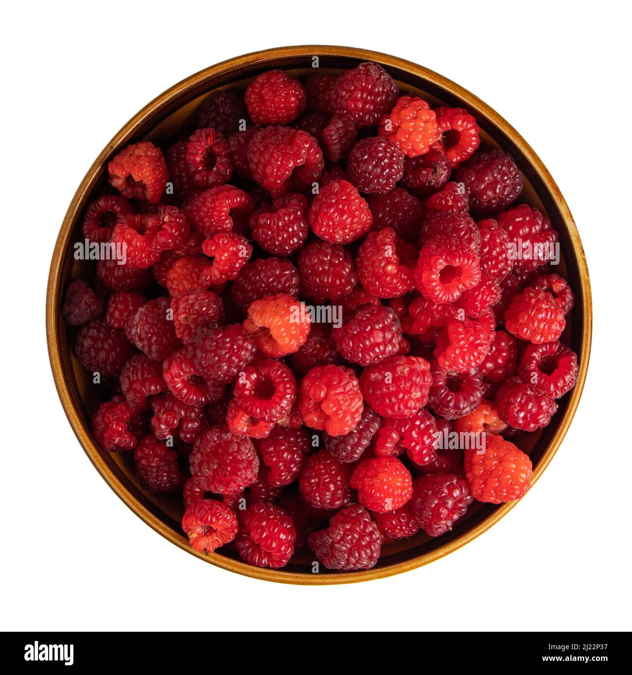 Bowl raspberry on wooden Cut Out Stock Images & Pictures - Alamy