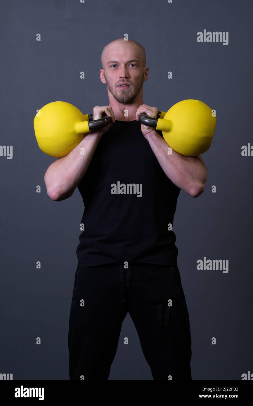 Guy with a yellow kettlebell gym anonymous yellow strength, for ...