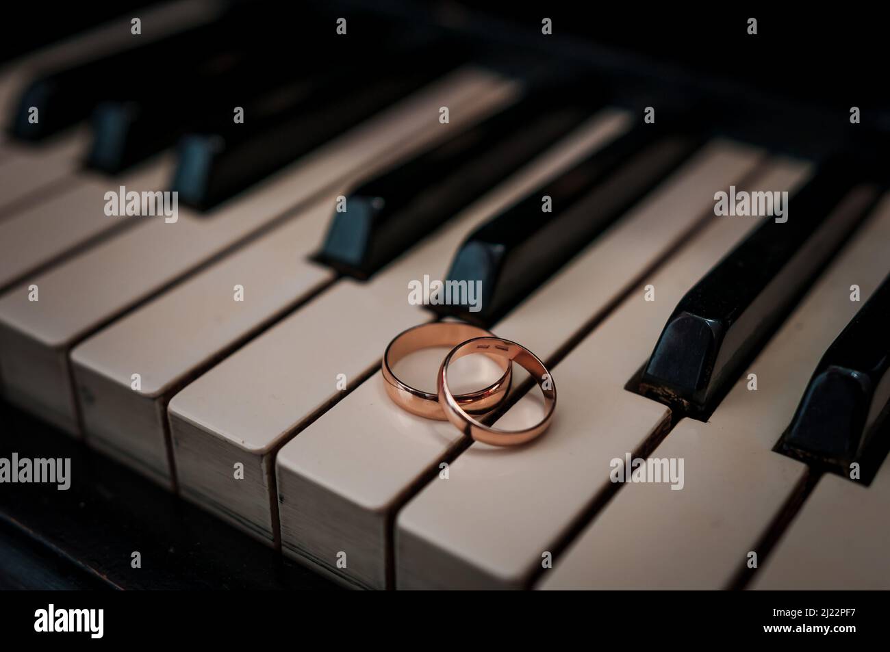 Wedding rings on piano hi-res stock photography and images - Alamy