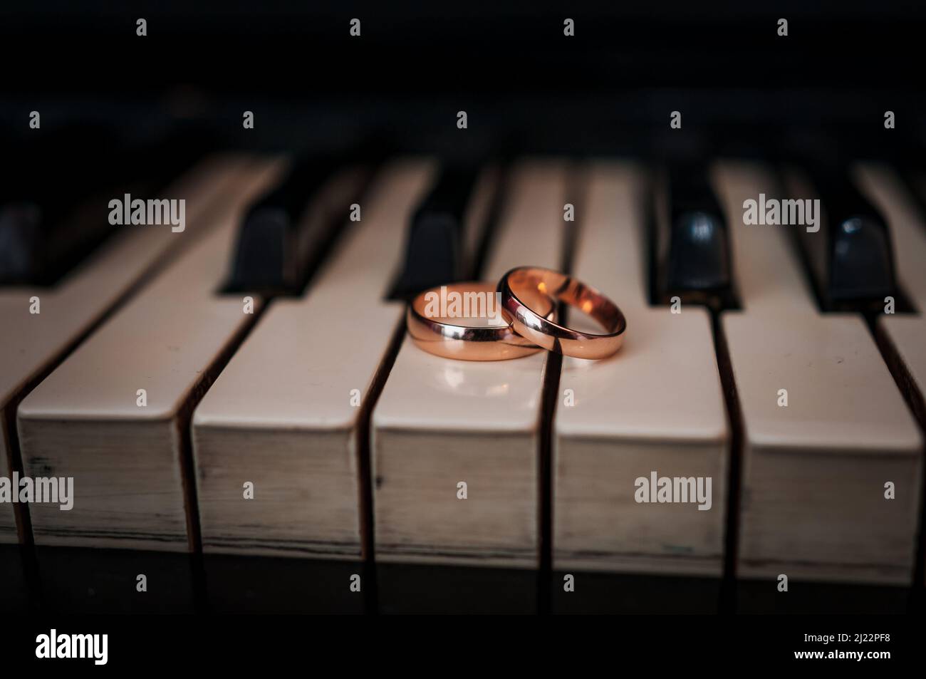 Wedding rings on piano hi-res stock photography and images - Alamy