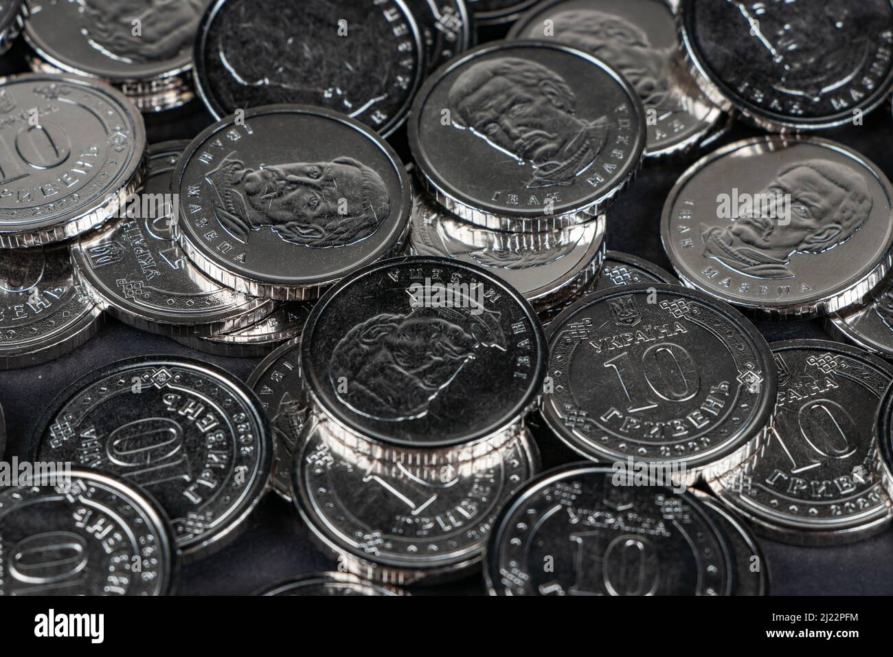 Silver coins background. Ukrainian 10 hryvnias coins. Money and ...
