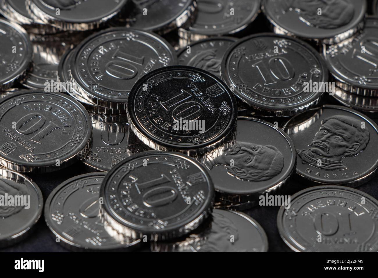 Silver coins background. Ukrainian 10 hryvnias coins. Money and ...