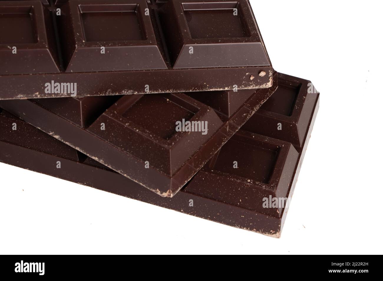 Three black chocolate bars isolated on white background Stock Photo - Alamy