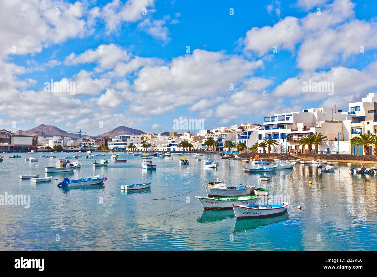 Arrecive, Spain - December 23, 2010: fisherman anchors the boat in ...