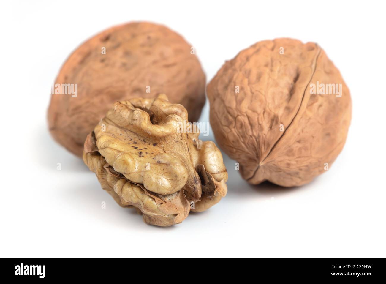 Three dried walnuts on Cut Out Stock Images & Pictures - Alamy