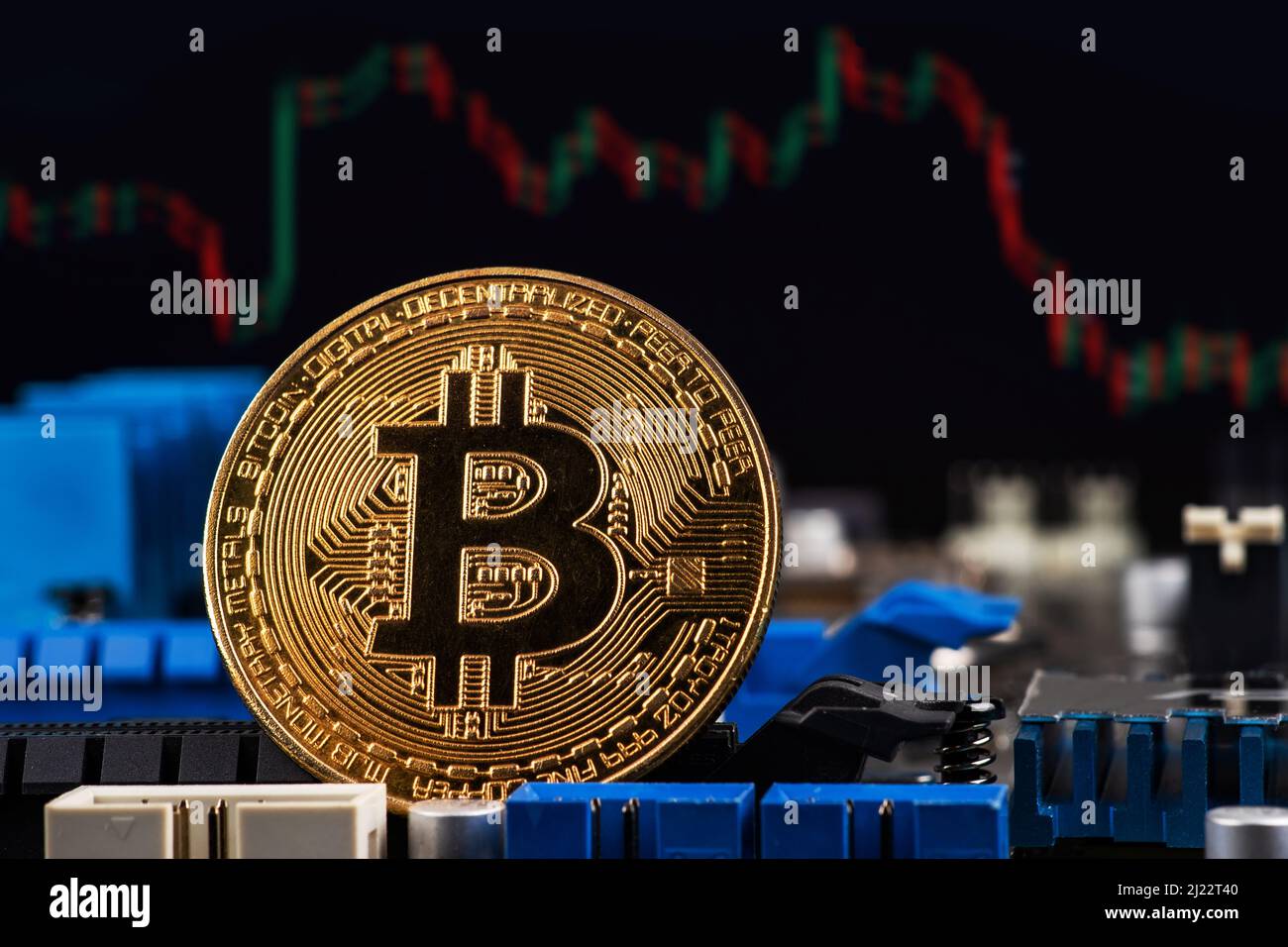 Bitcoins and virtual money concept. Gold bitcoins on a stack of coins ...