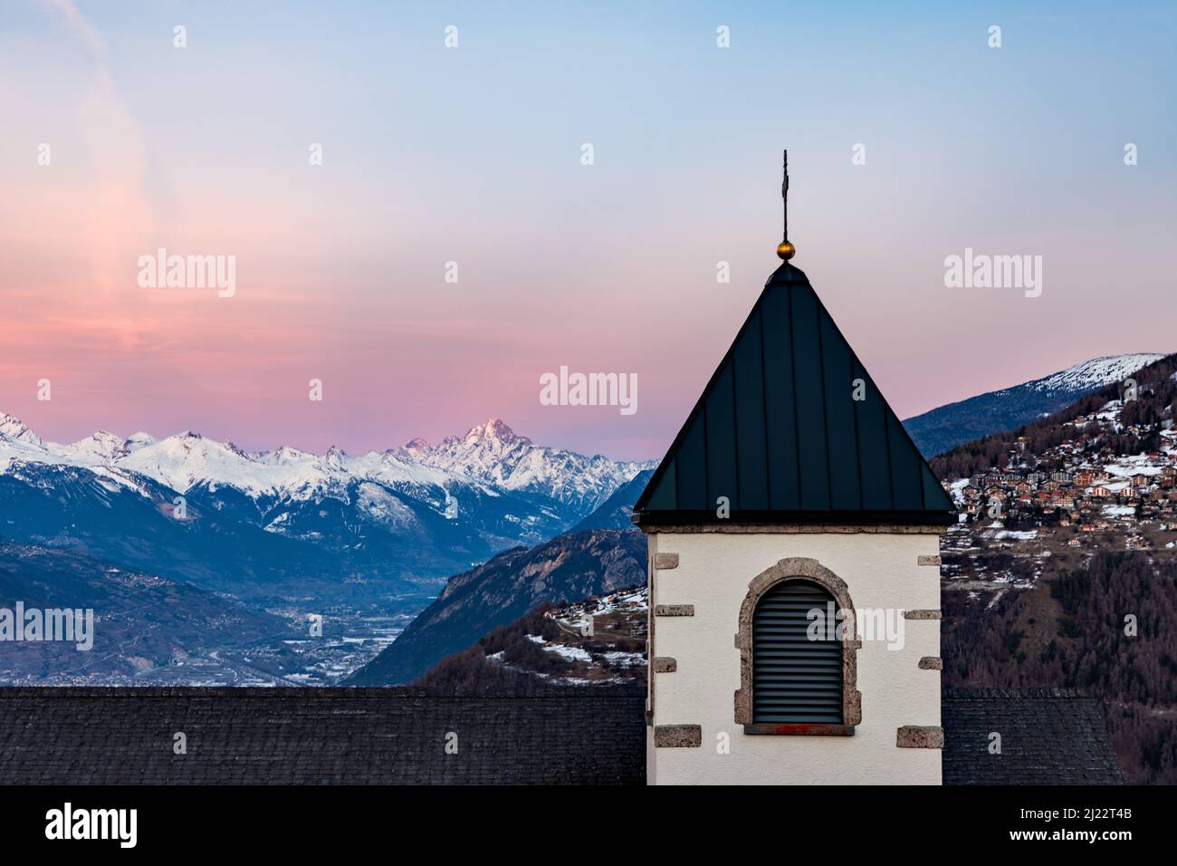Beautiful historic church in small village at the Swiss alps during ...